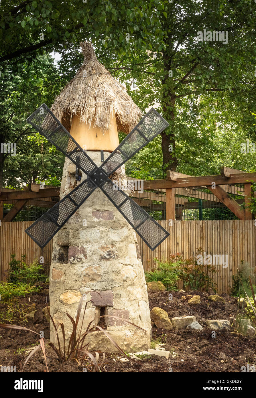 Garden Windmill - miniature replica windmill with thatched roof Stock ...