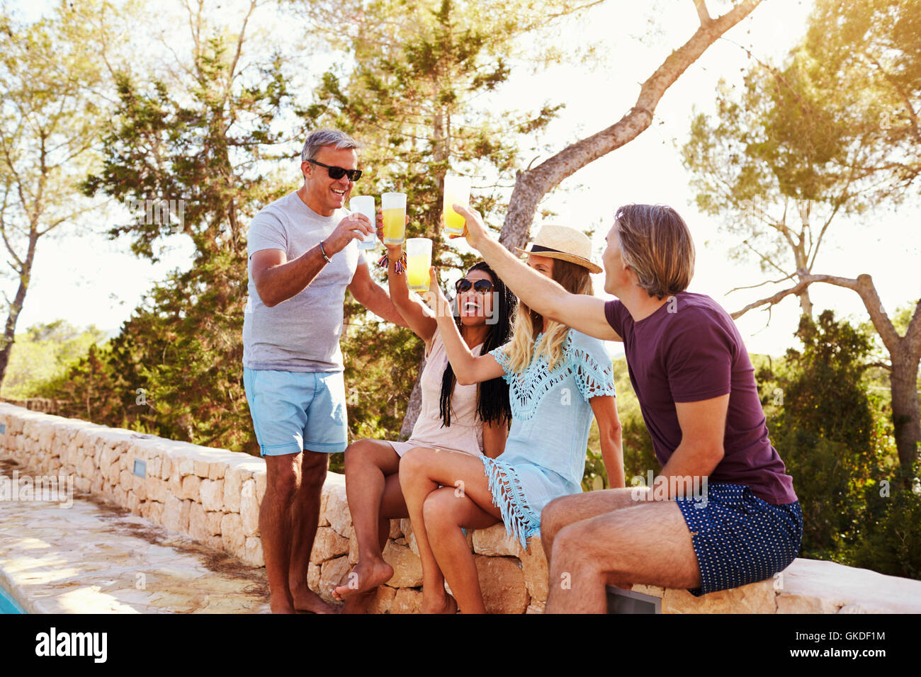 Friends socialising home couples hi-res stock photography and images ...