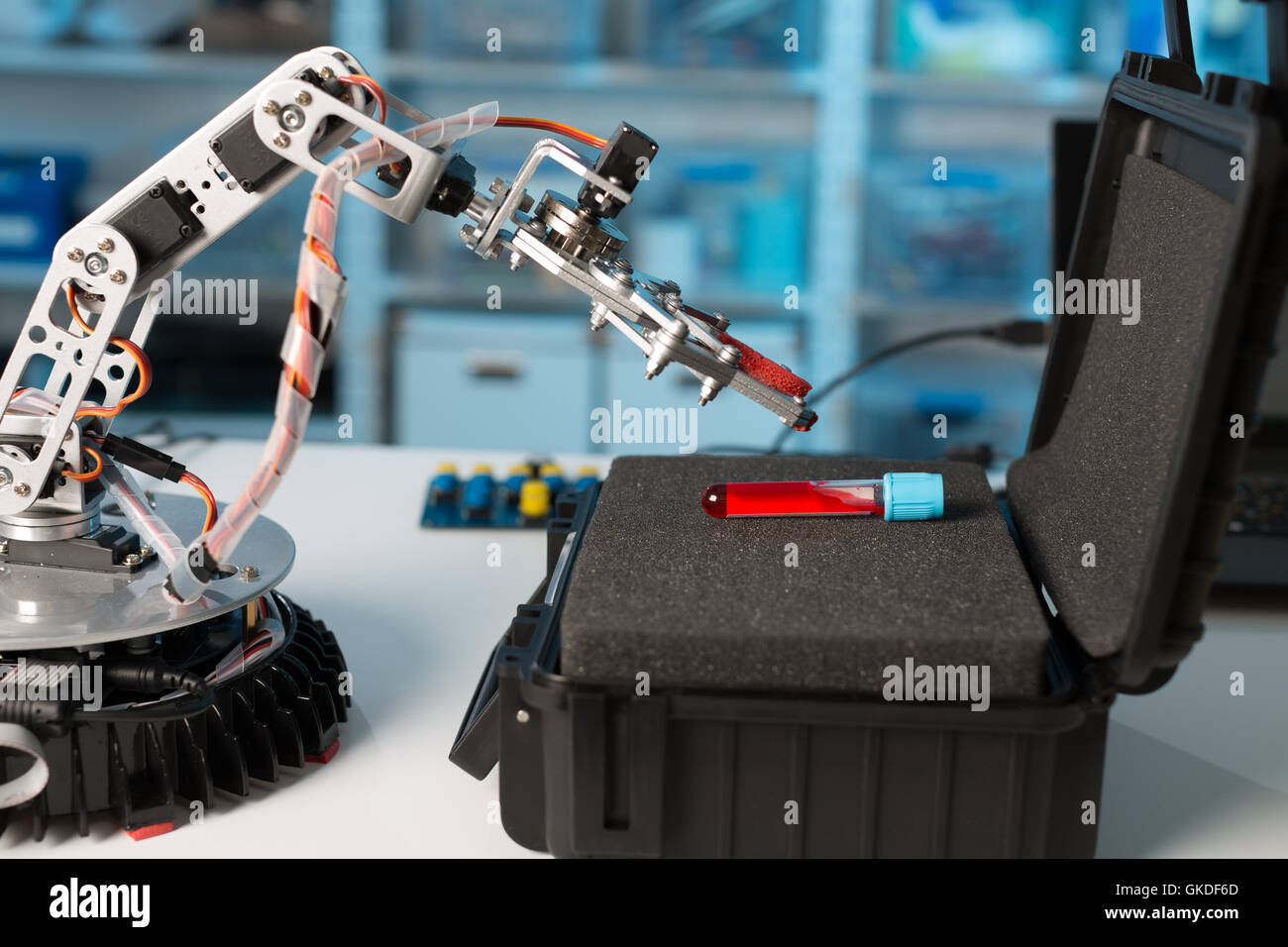 Robot arm with test tube Stock Photo - Alamy