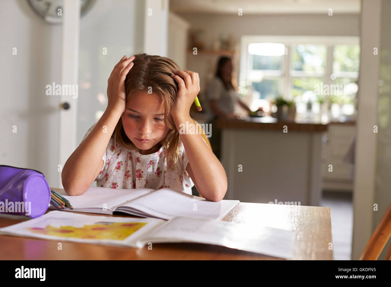 Girl frustrated by difficult homework Stock Photo - Alamy