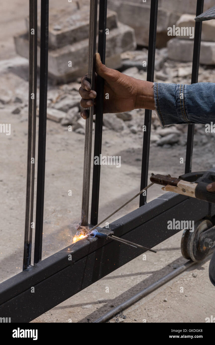 worker welding at manufacturing , welding door frames Stock Photo - Alamy