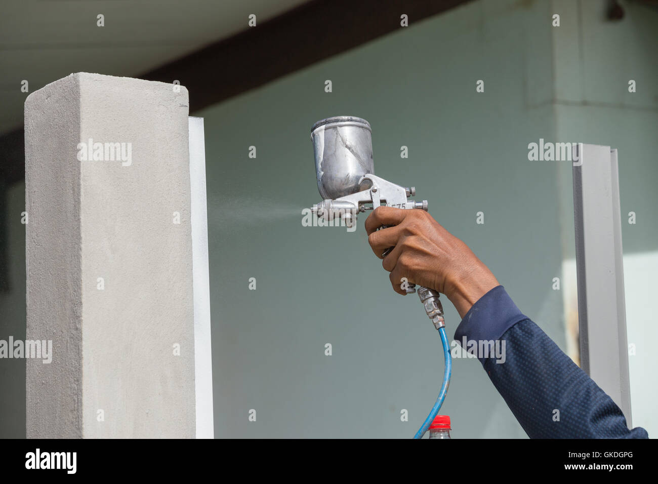 Painters were spray painting the steel frame Stock Photo - Alamy