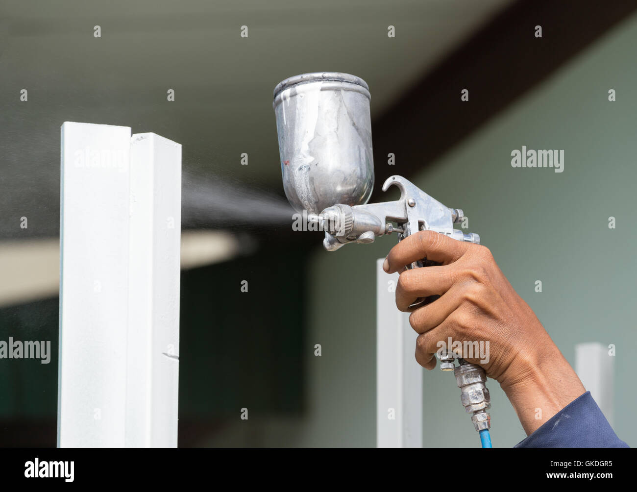 Painters were spray painting the steel frame Stock Photo - Alamy