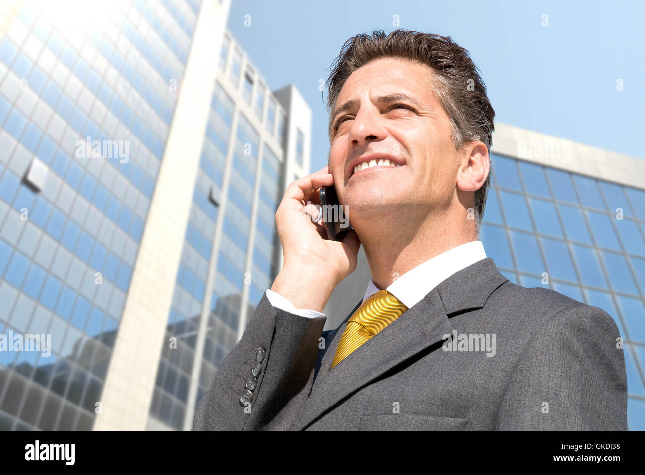 Men suit phone hi-res stock photography and images - Alamy