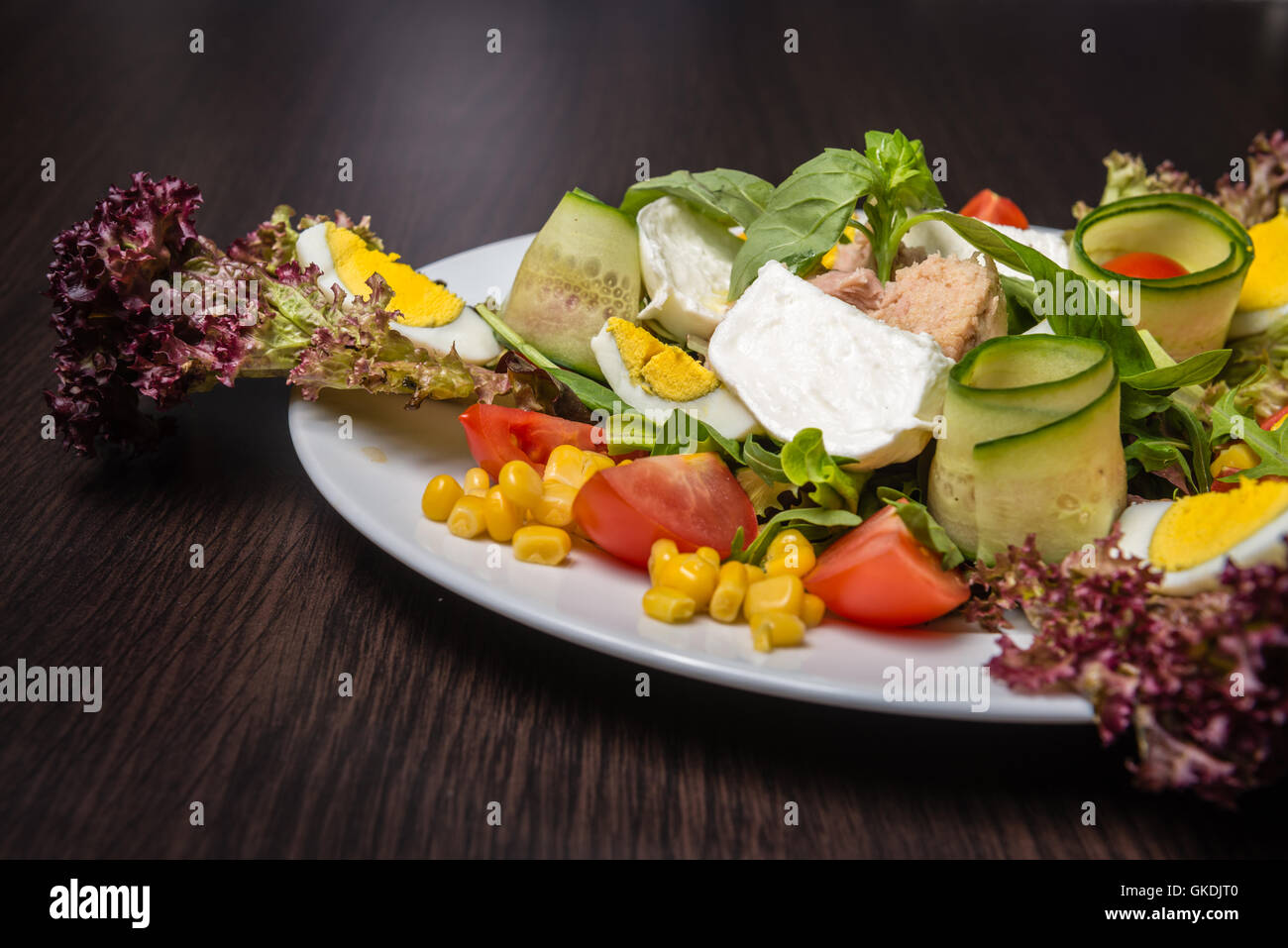 Italian food on white plate Stock Photo - Alamy