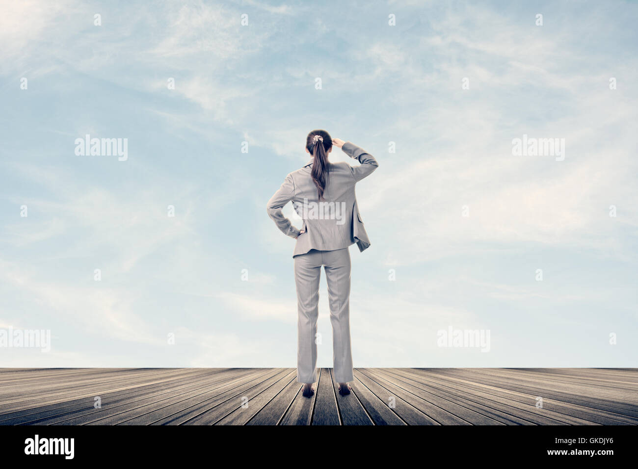 Woman look away back hi-res stock photography and images - Alamy