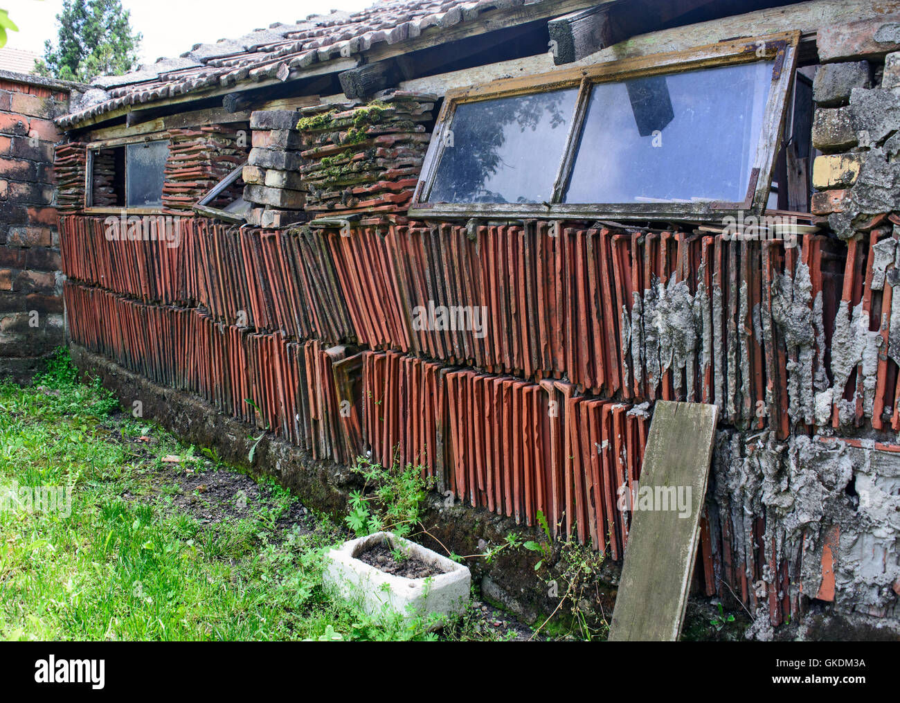 The old dilapidated building that was built on the tiles Stock Photo ...