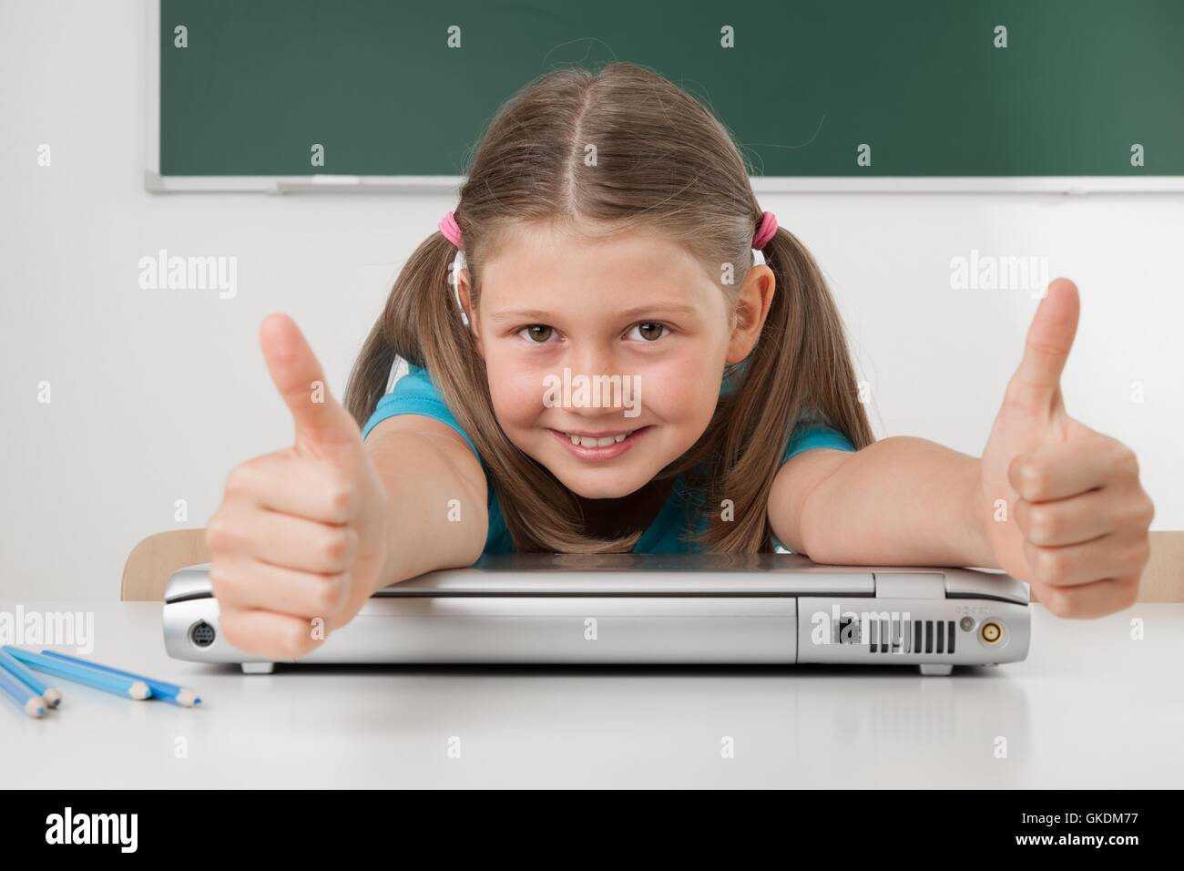 student showing thumbs up Stock Photo - Alamy