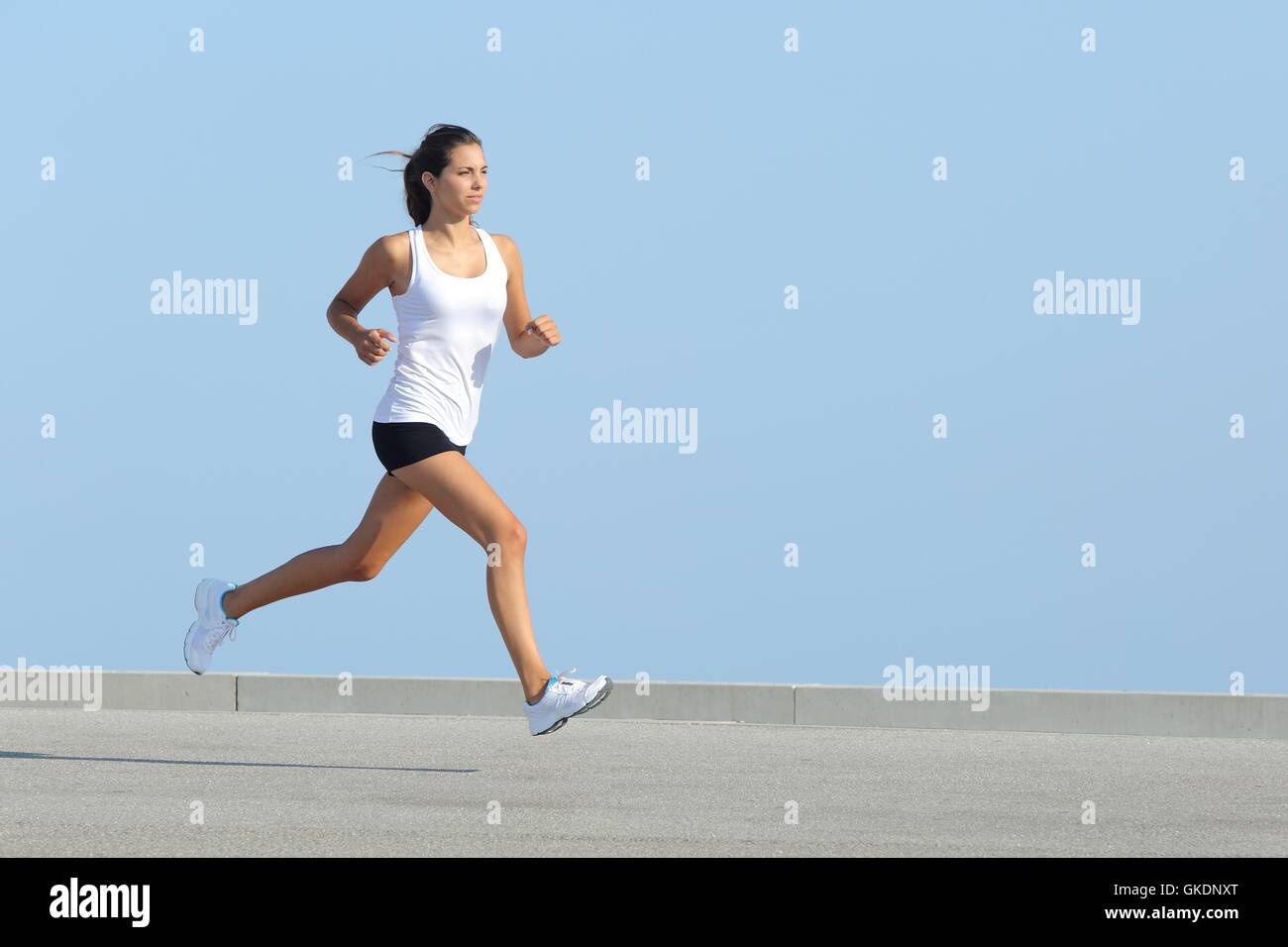 Woman with muscled legs hi-res stock photography and images - Alamy
