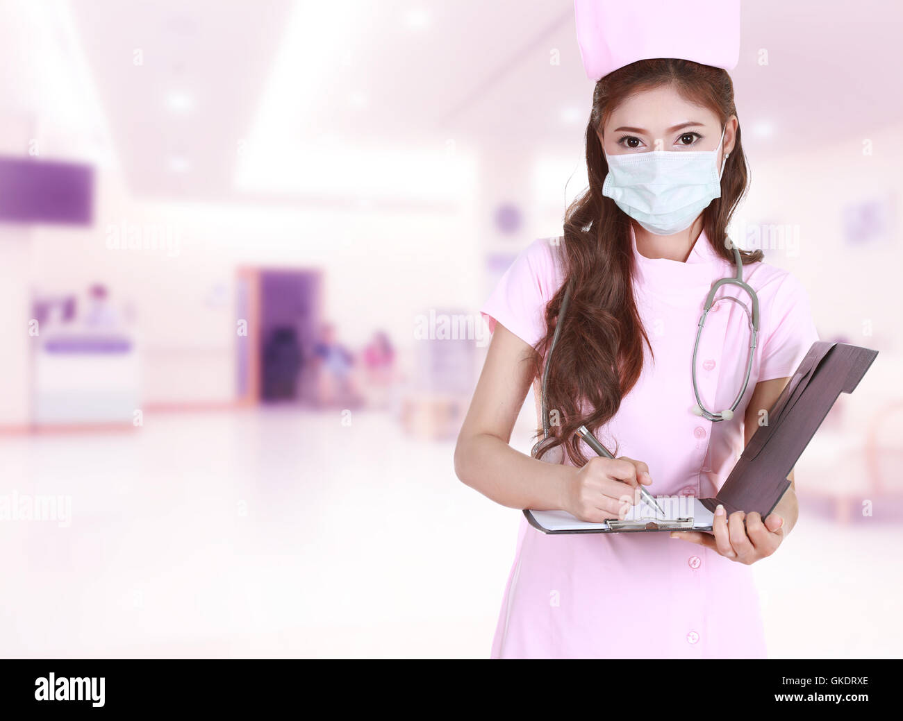 Portrait beautiful nurse writing hi-res stock photography and images ...