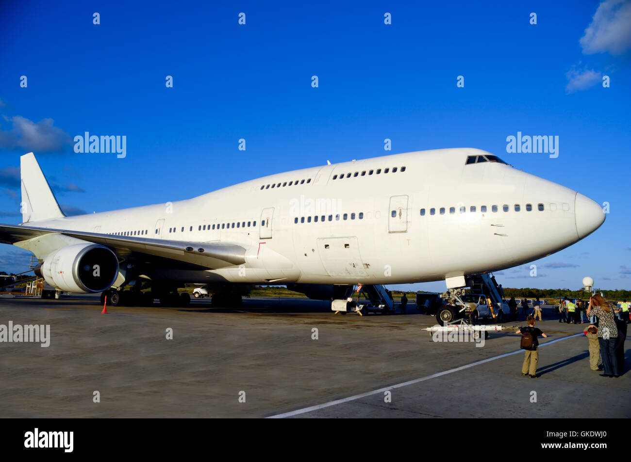 Jumbojet plane in airport Stock Photo - Alamy