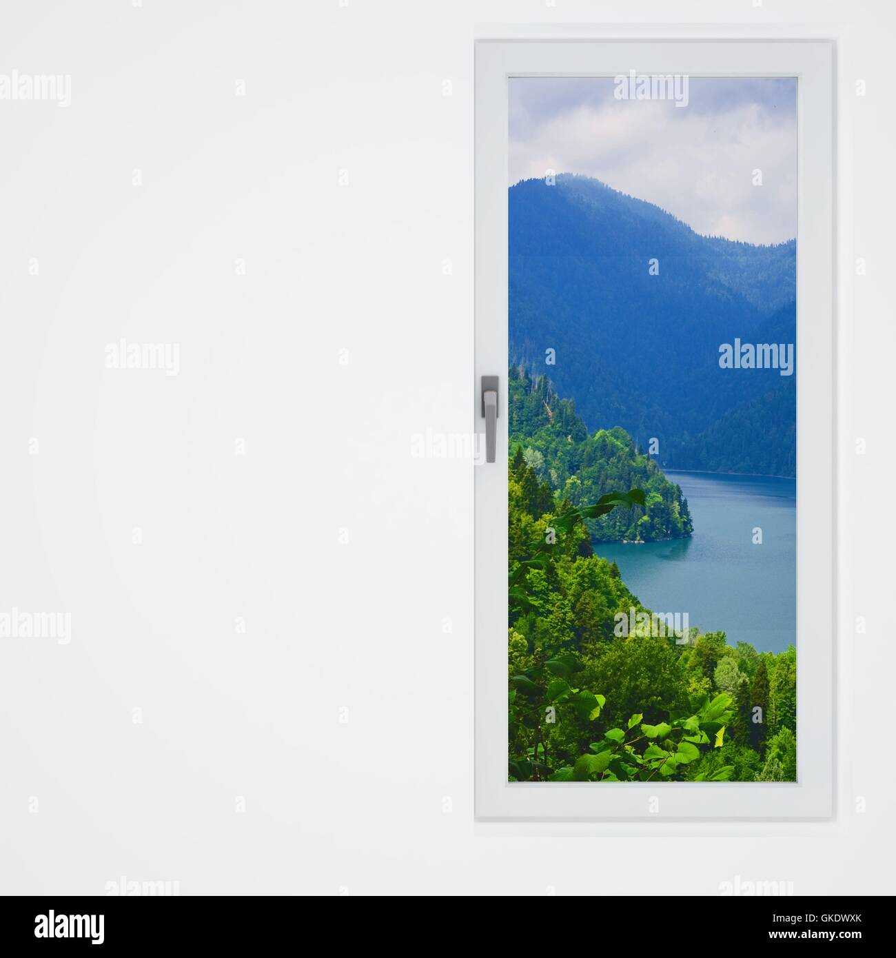 white wall and window with a beautiful view on mountains and lake Stock ...
