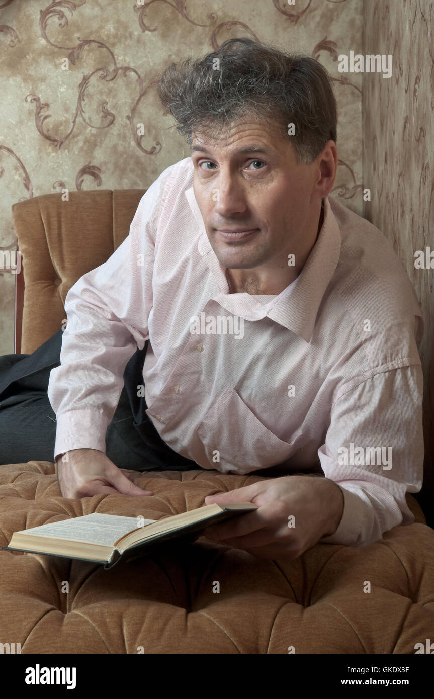 A man with a book Stock Photo - Alamy