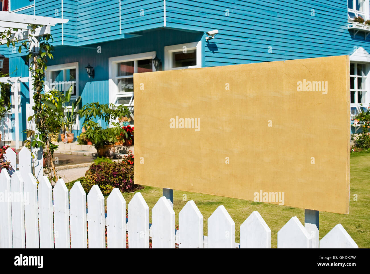 Blank wooden board for rent or sell estate Stock Photo - Alamy