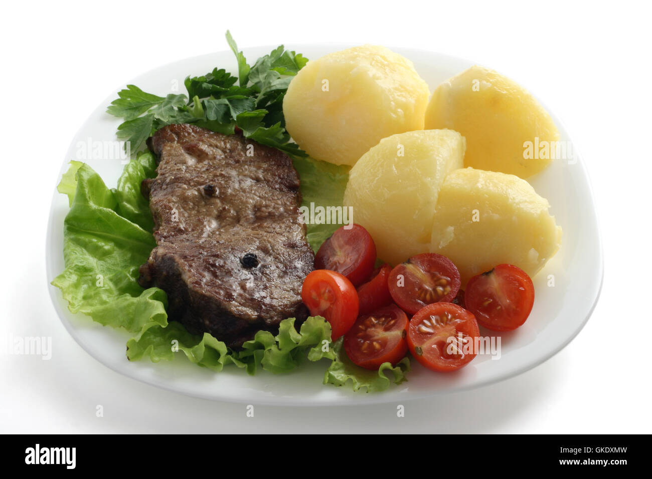 fried beef with boiled potato Stock Photo - Alamy