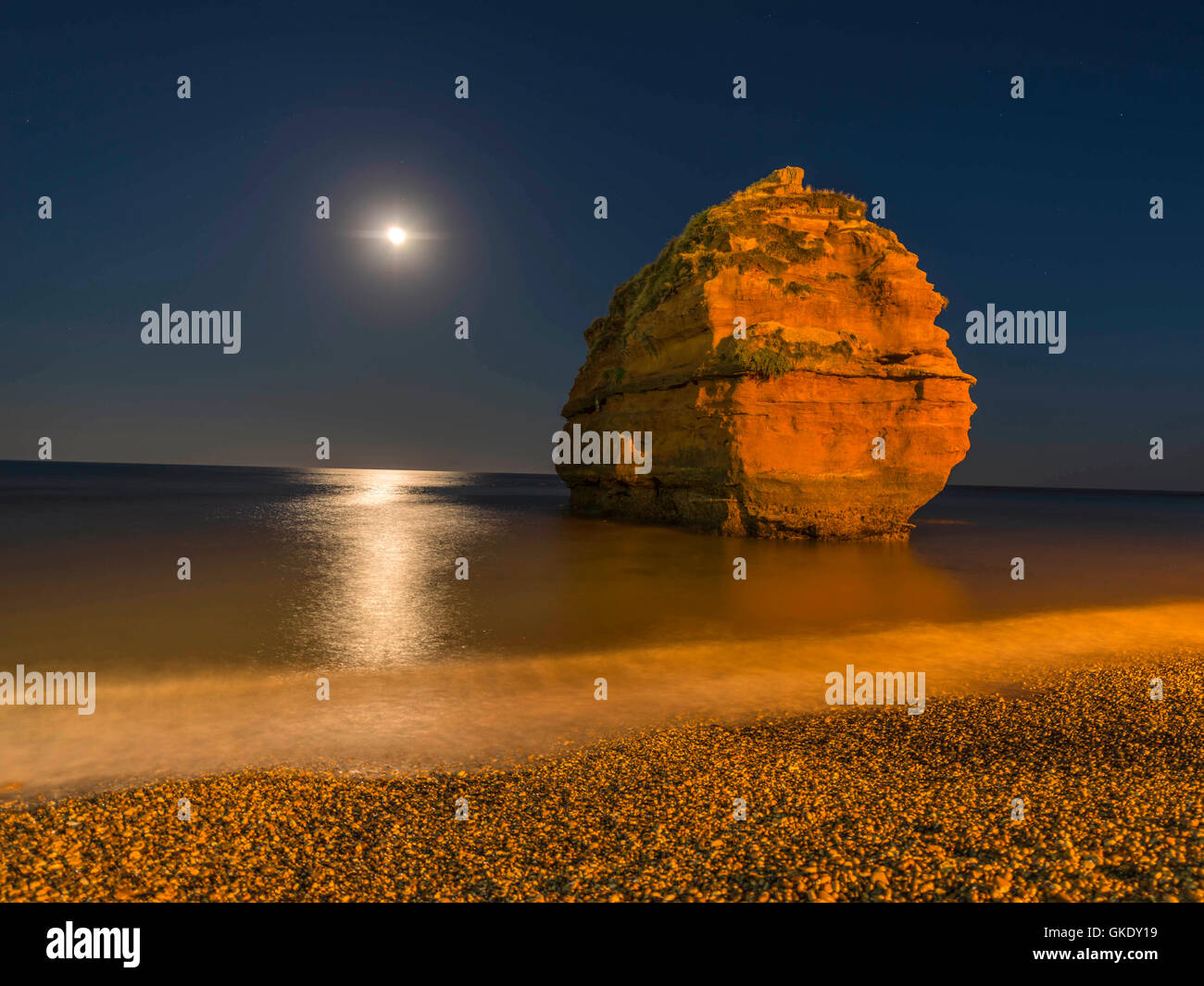 Jurassic coast rock formation by moonlight at Ladram Bay Cove, Devon ...