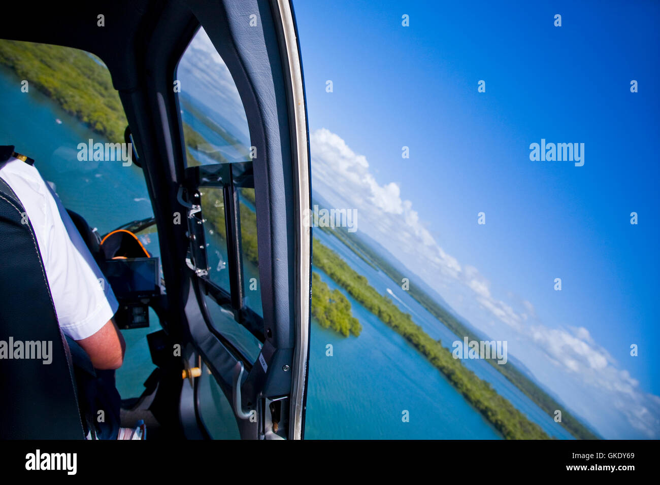 inside helicopter in air without door looking at scenery Stock Photo ...