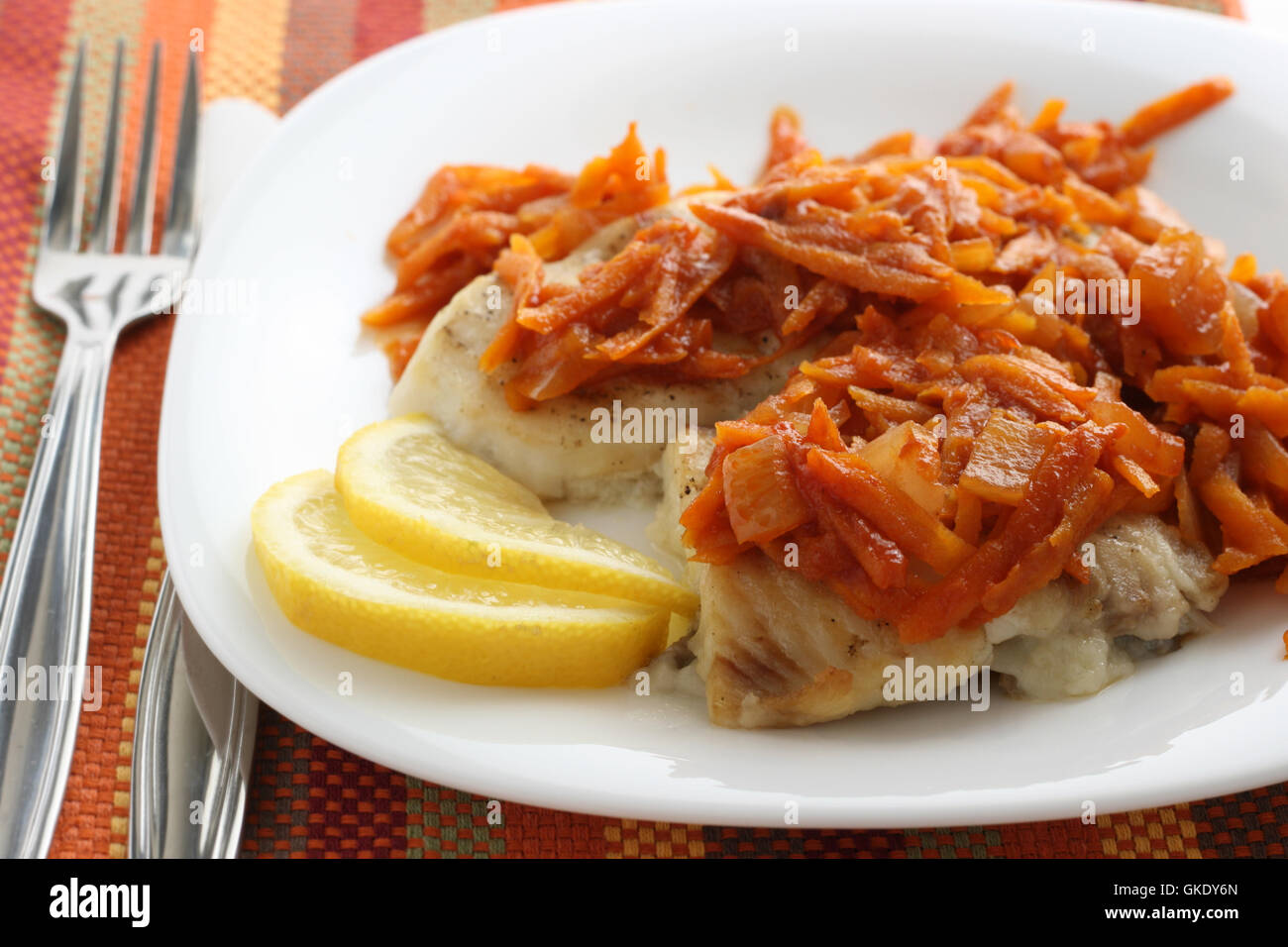 fish with fried carrot and lemon Stock Photo - Alamy