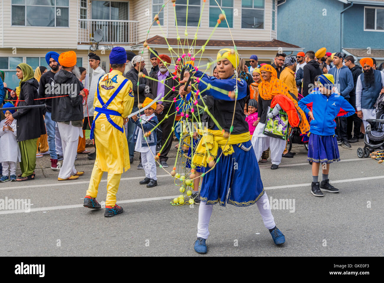 A young Sikh warrior twirls, an unarmed Chakari flail weapon that can ...