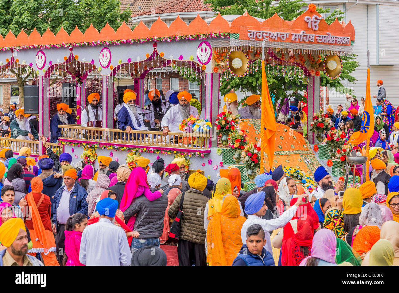 Colourful Parade float carrying the holy scripture, Guru Granth Sahib ...