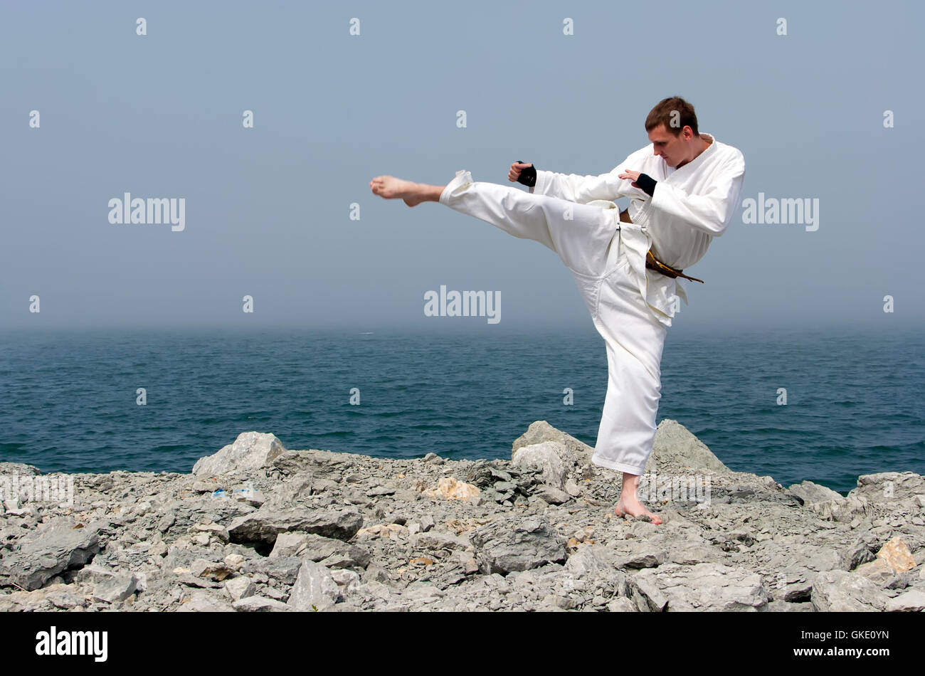 karate on the shores of the misty sea Stock Photo - Alamy