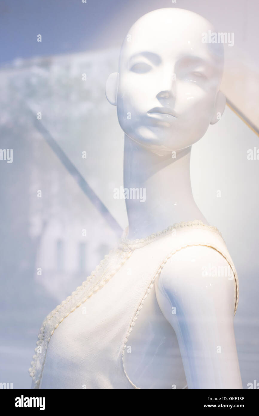 Store window fashion retail shop female mannequin bald dummy Stock ...