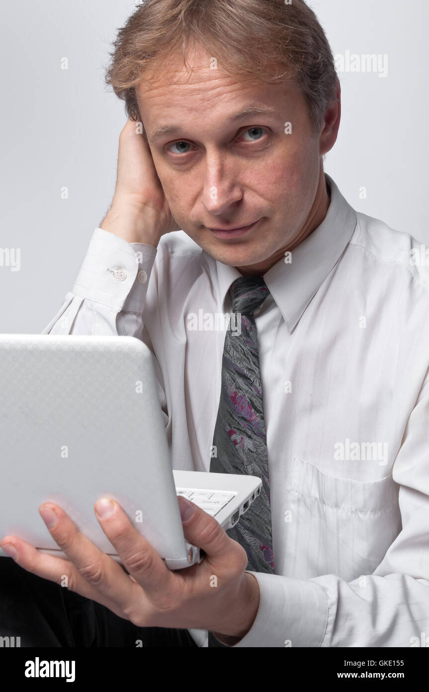 Man with laptop Stock Photo - Alamy