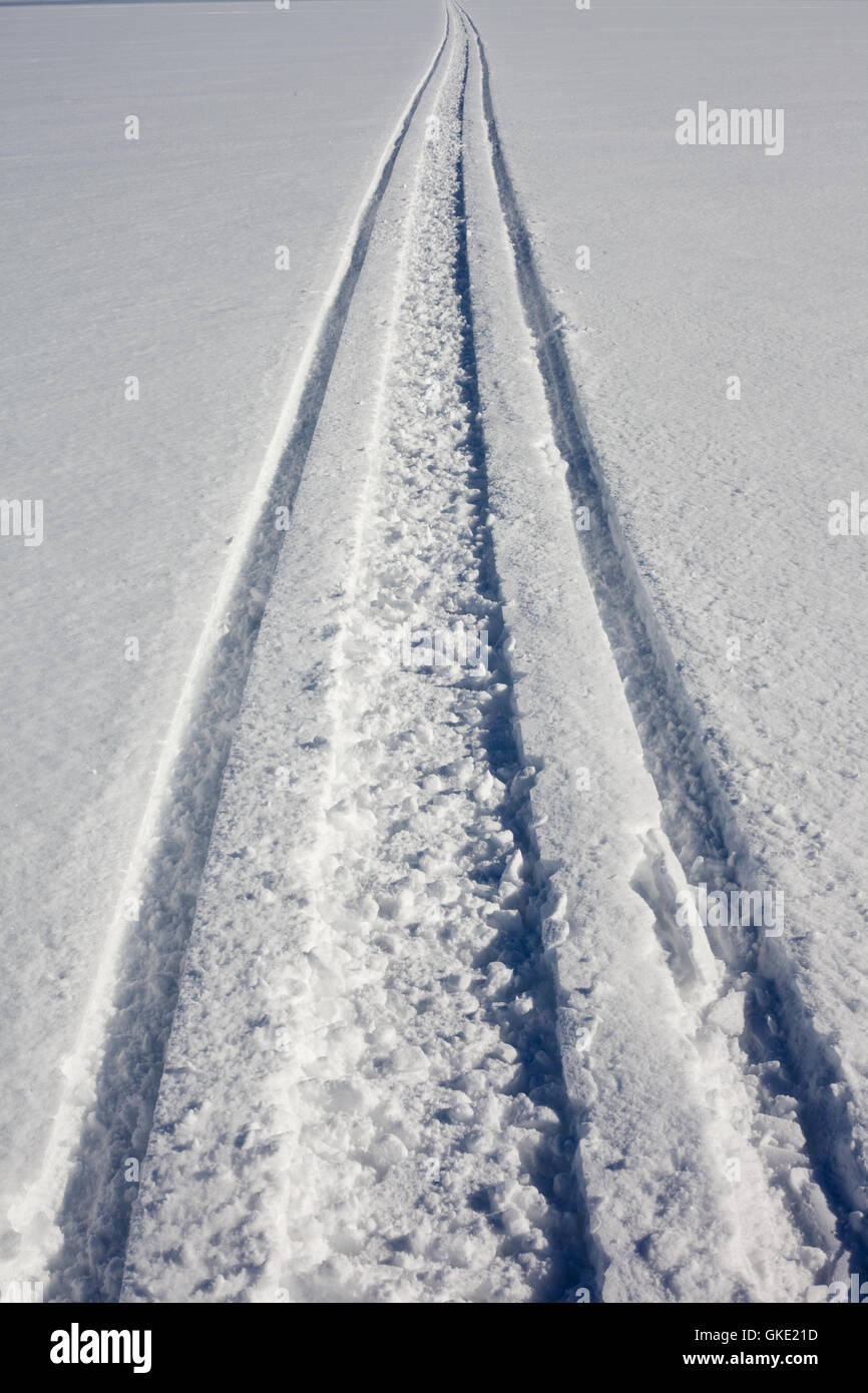 Skidoo track in fresh clean snow Stock Photo - Alamy