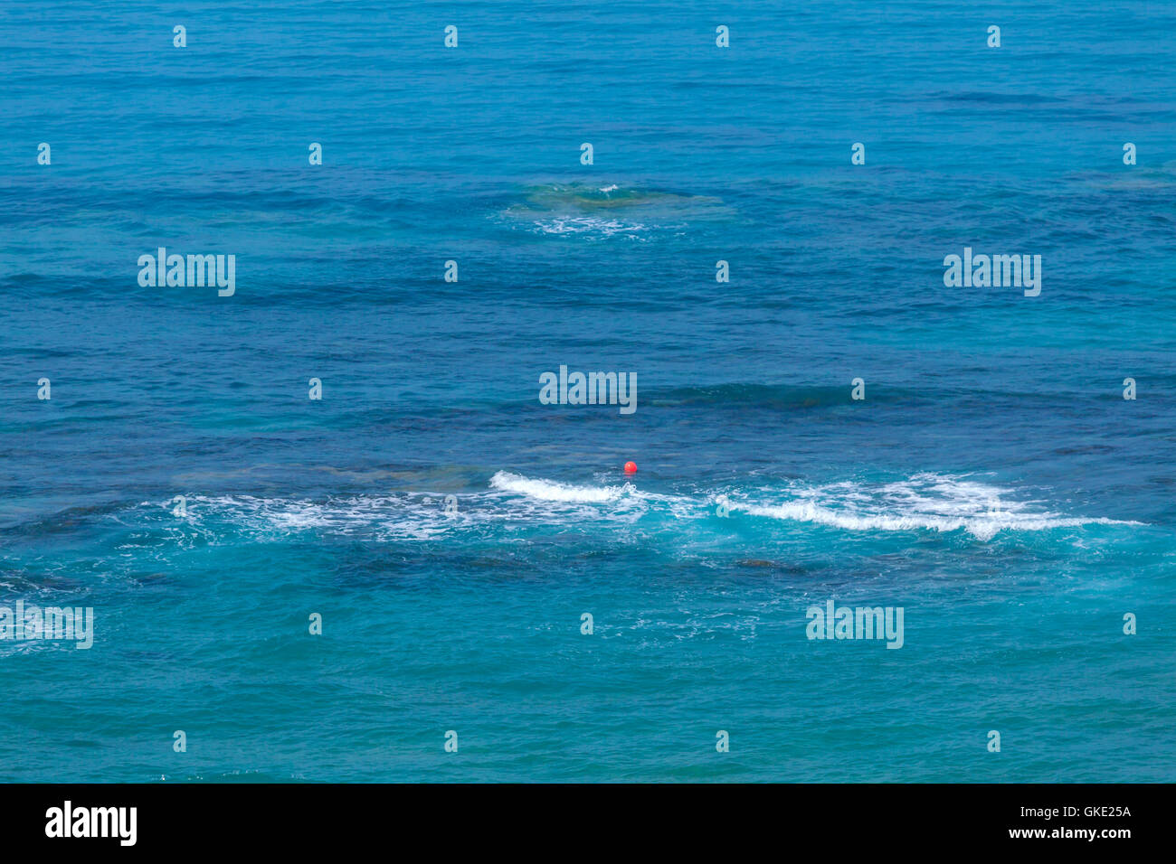 Red buoy and Mediterranean sea waves, Cyprus Stock Photo - Alamy