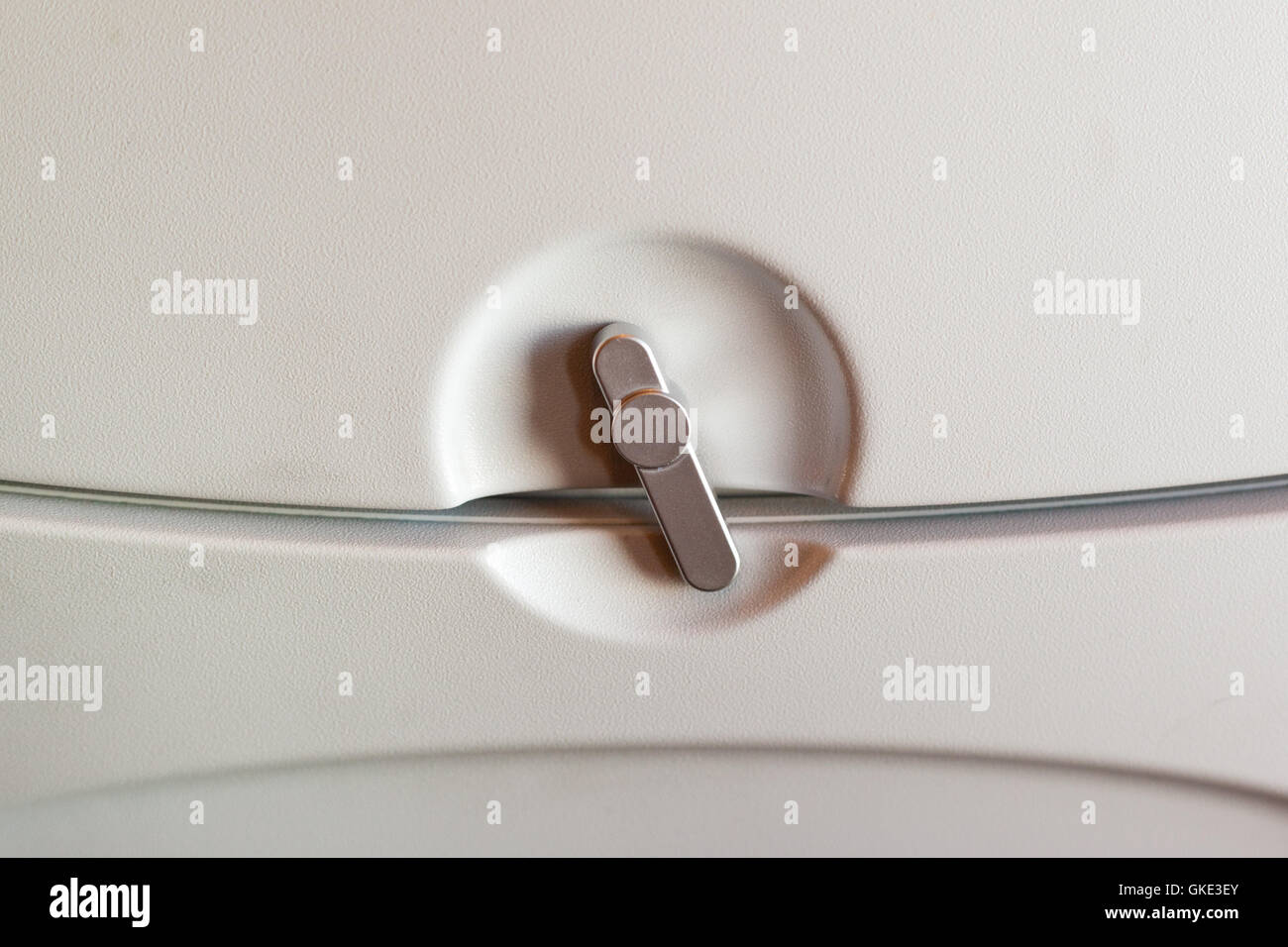 Abstract of latched back table in passenger plane Stock Photo - Alamy
