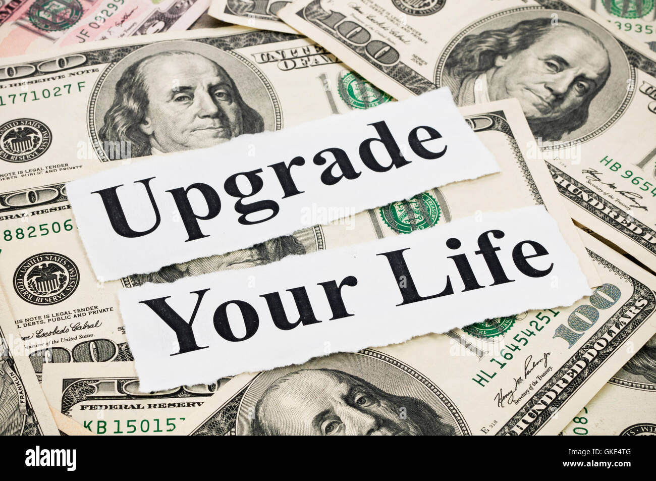 Upgrade your life by money Stock Photo - Alamy
