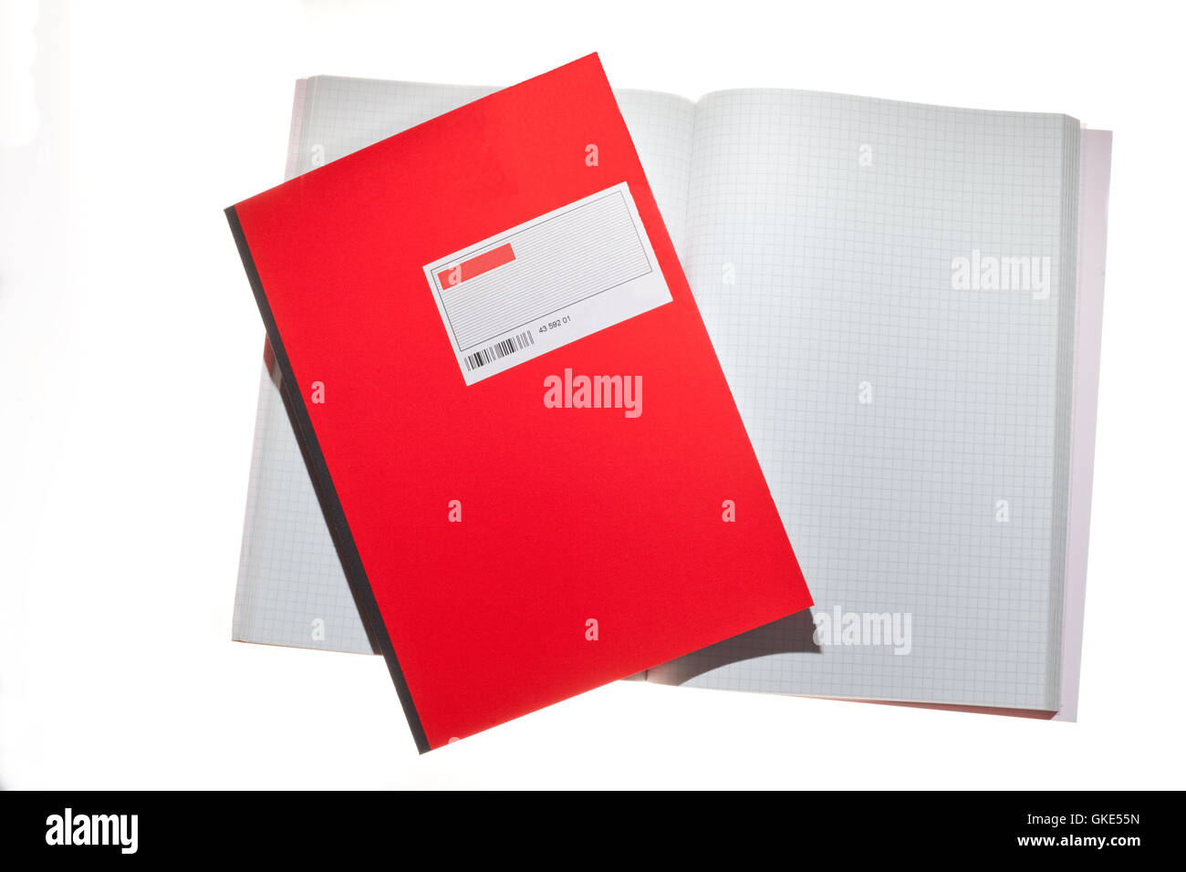 Red hard-backed notebooks Stock Photo - Alamy