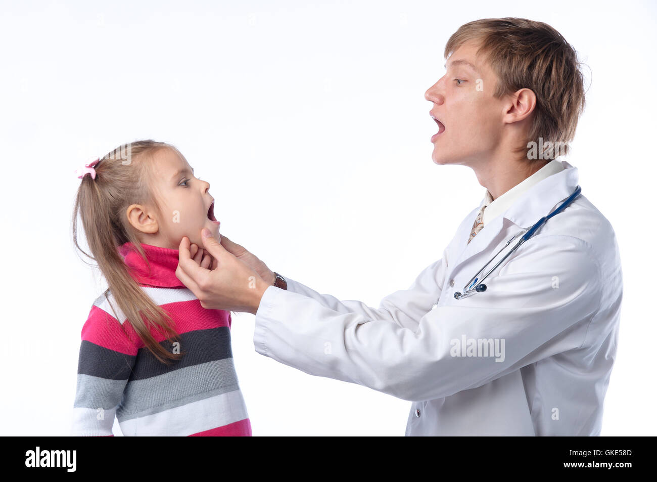 The doctor and the little girl Stock Photo - Alamy