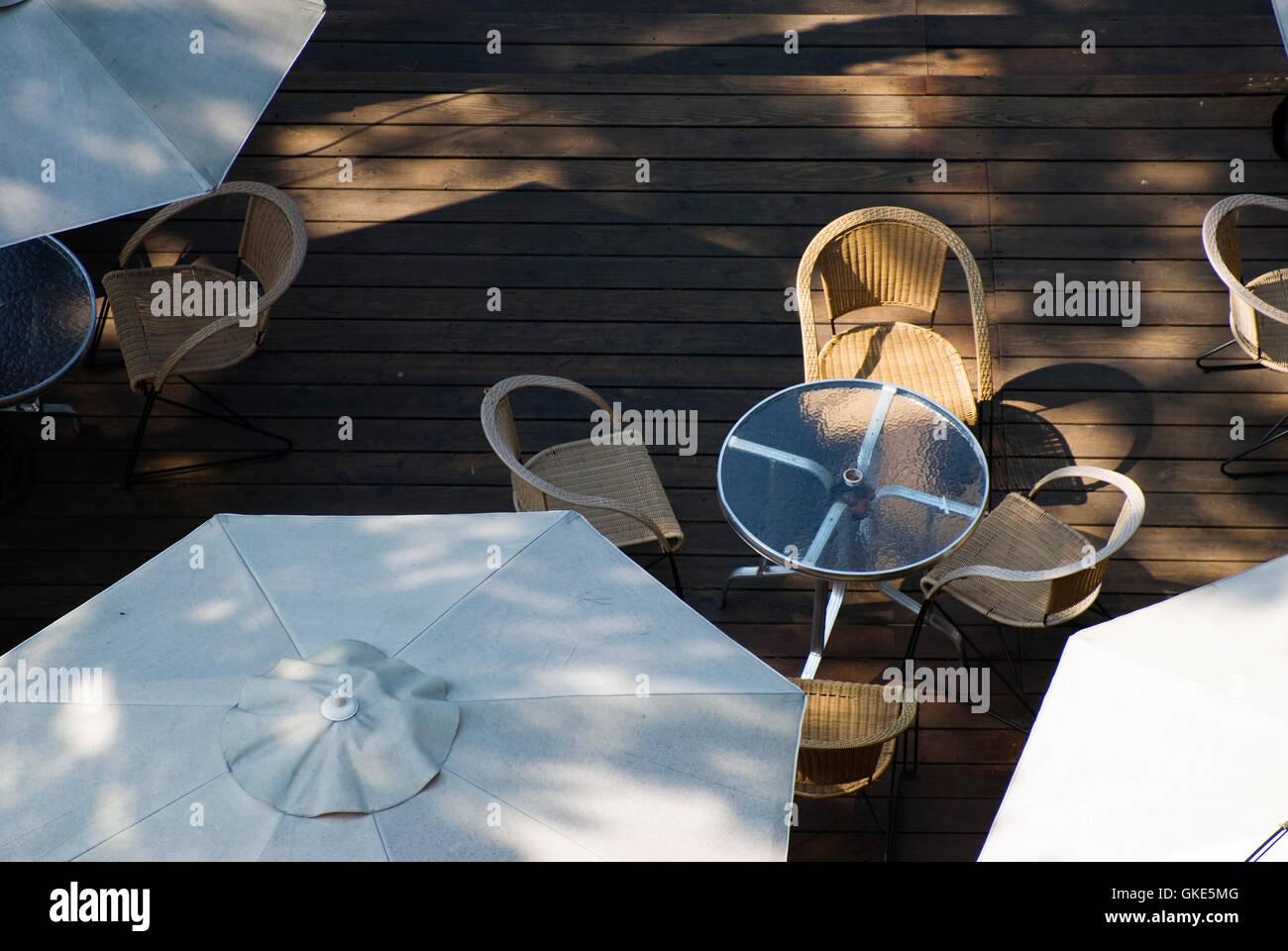 Outdoor coffee table on wooden ground Stock Photo - Alamy