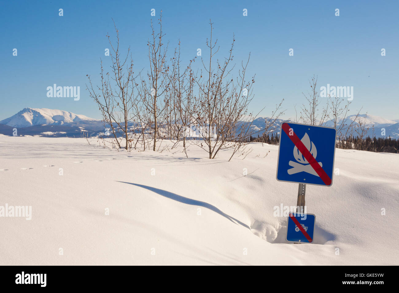 Funny signpost in snowdrift Stock Photo - Alamy