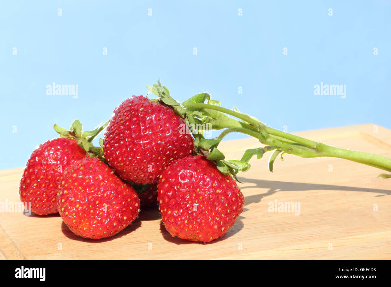 Sprig of strawberries hi-res stock photography and images - Alamy