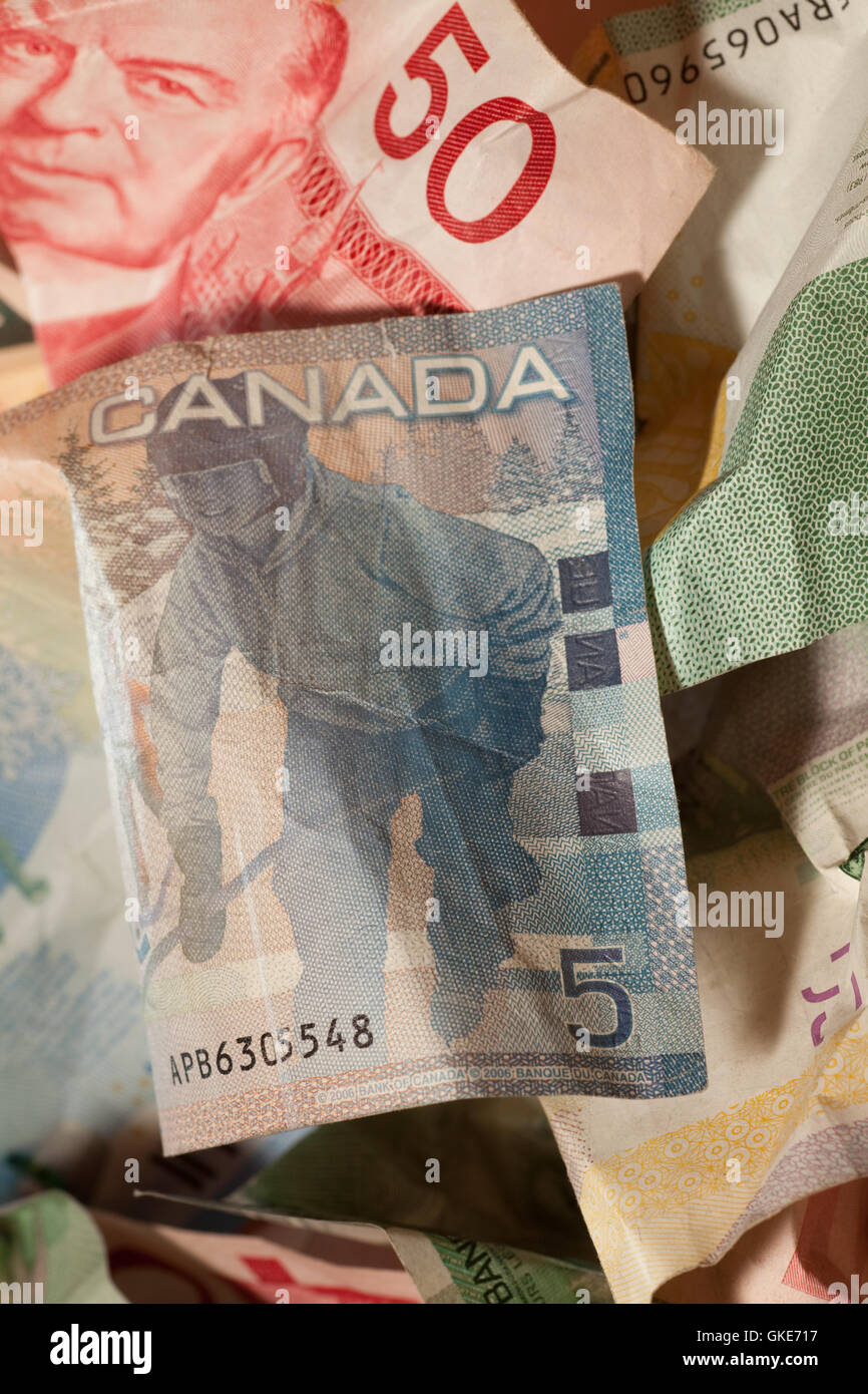 Crinkled Canadian dollar bills closeup Stock Photo - Alamy