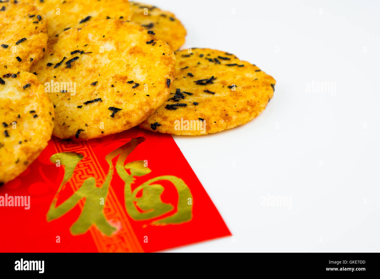 Chinese new year red packet with cookies Stock Photo - Alamy
