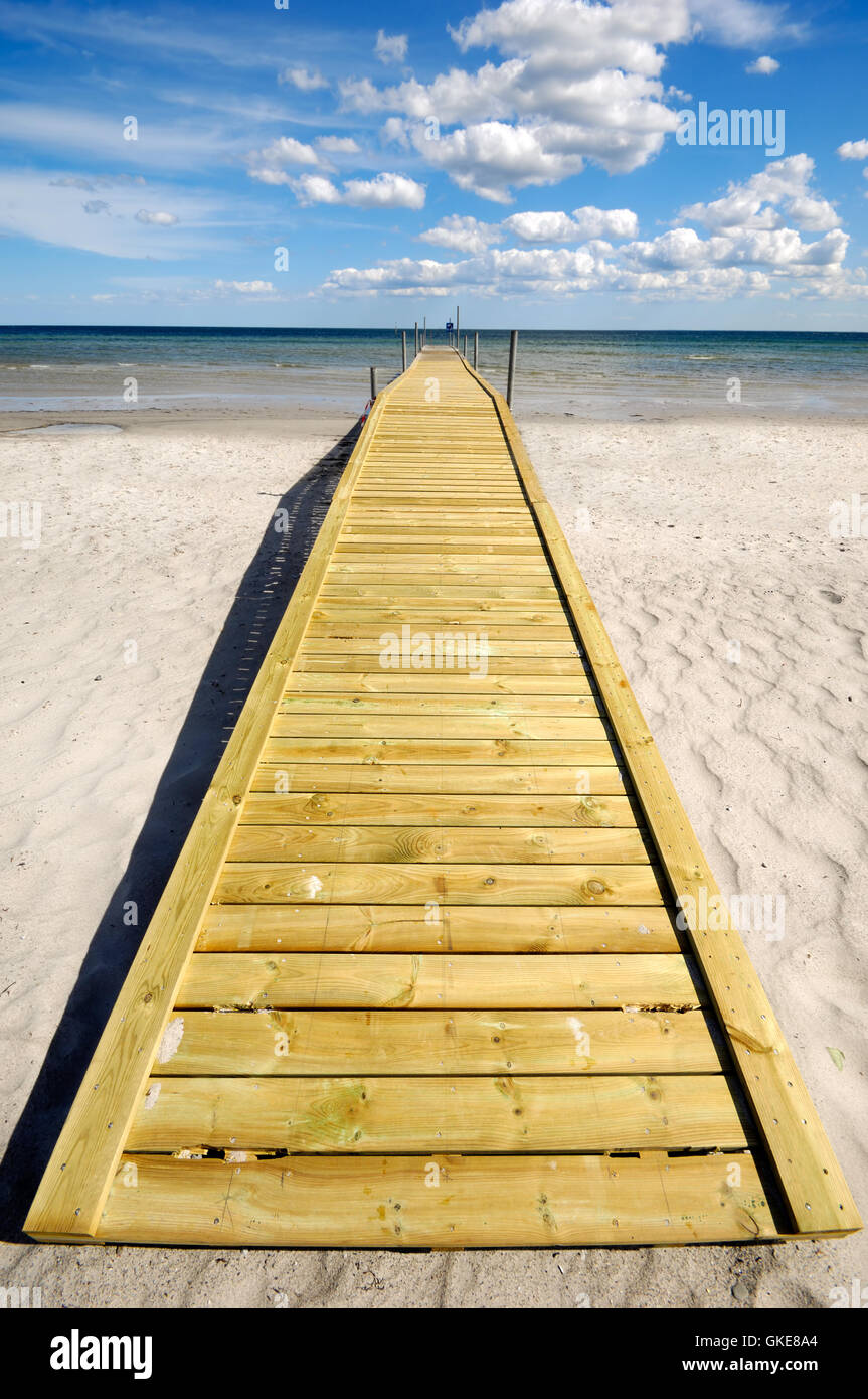 Bridge on beach Stock Photo - Alamy