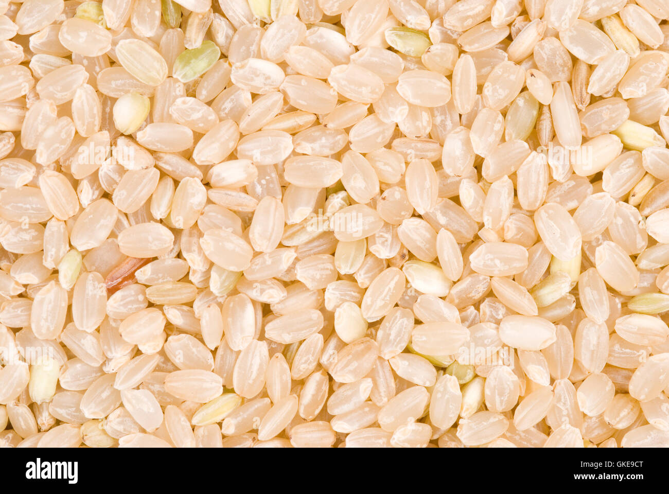 brown rice as background Stock Photo - Alamy