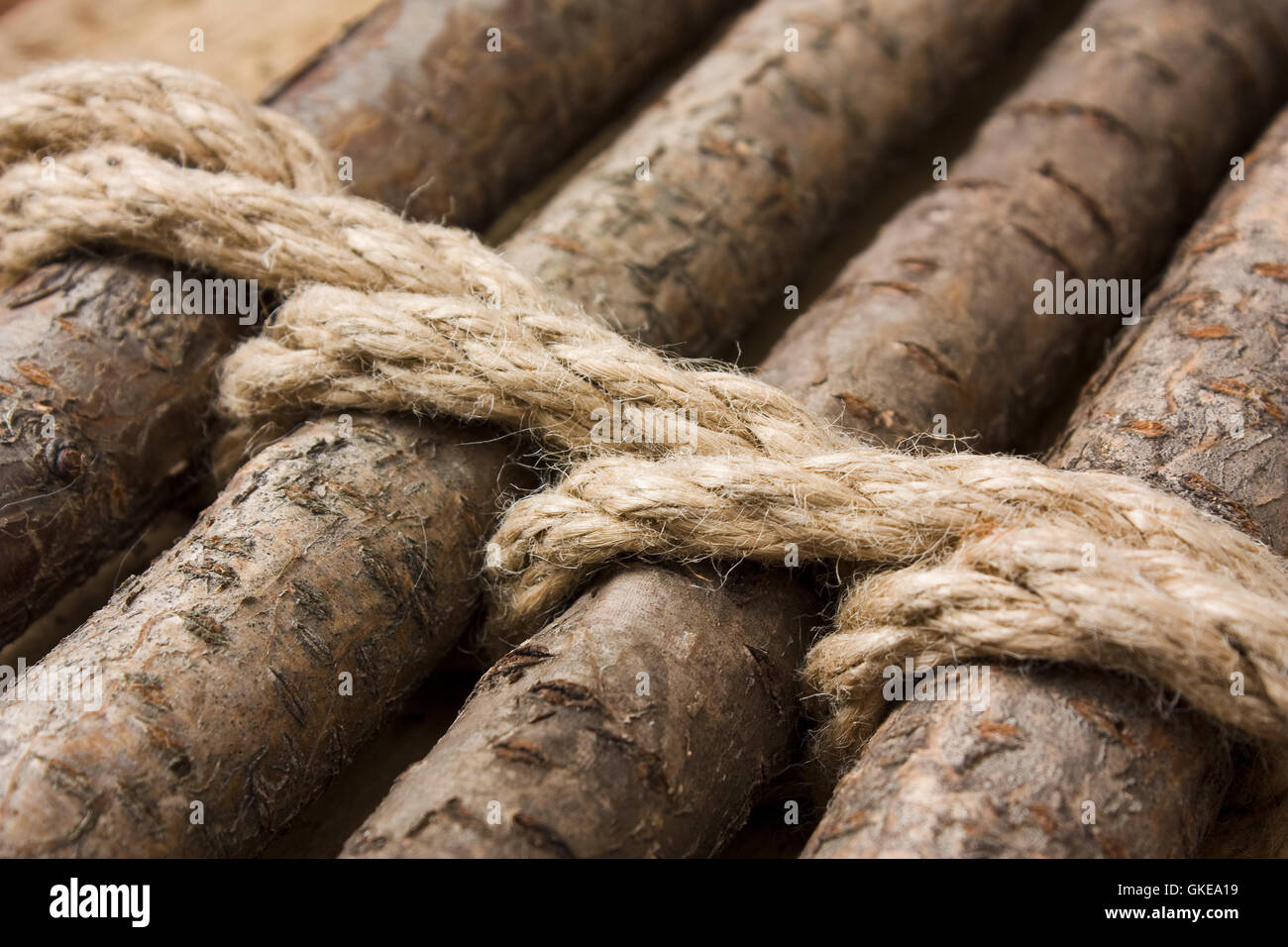 Strips of wood bound with rope Stock Photo - Alamy