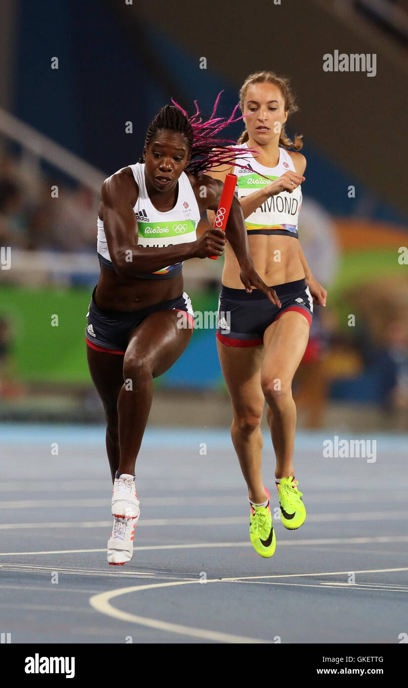 Great Britain's Emily Diamond passes the baton onto Anyika Onuora ...