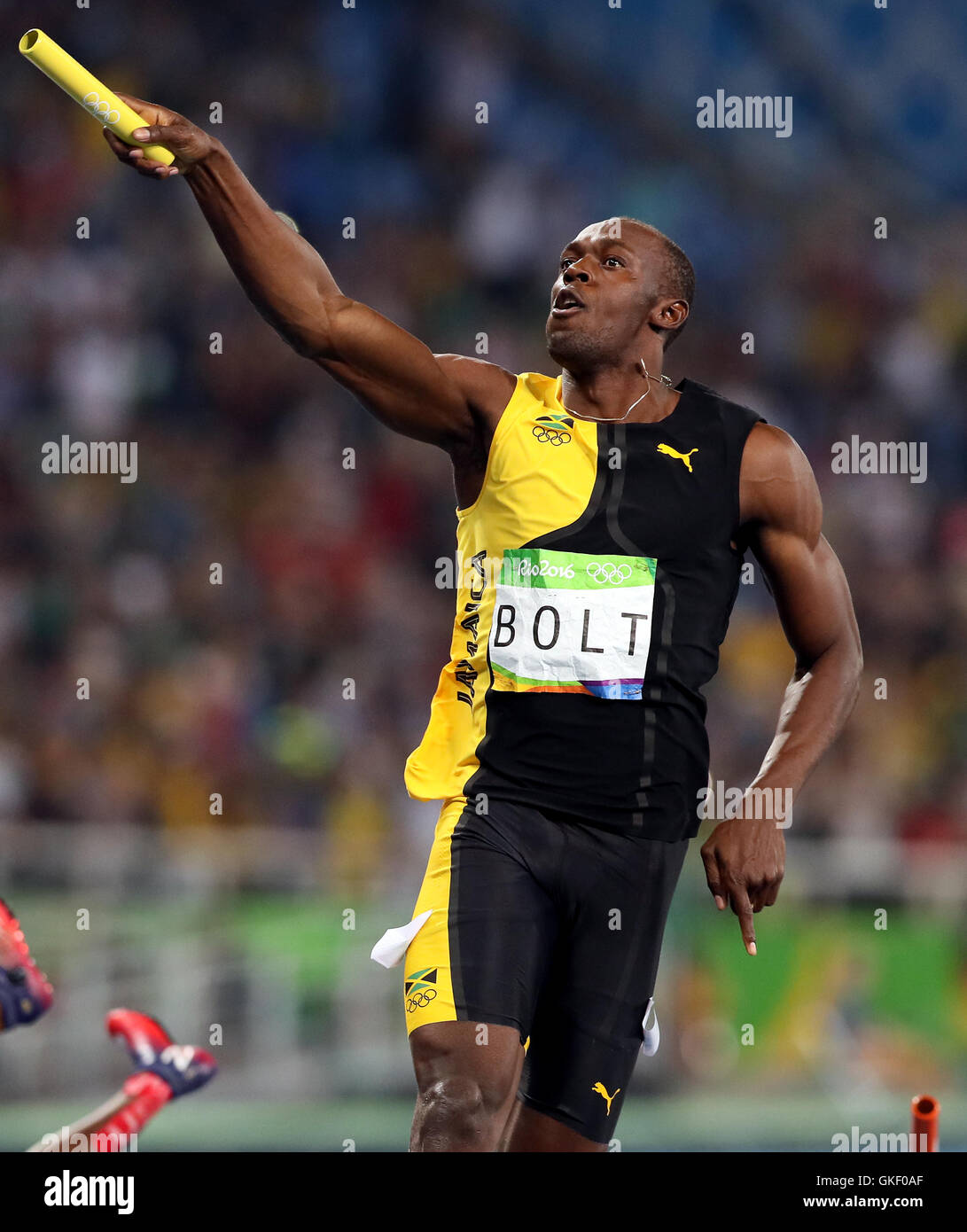 Jamaica's Usain Bolt celebrates after anchoring his Men's 4 x 100m ...