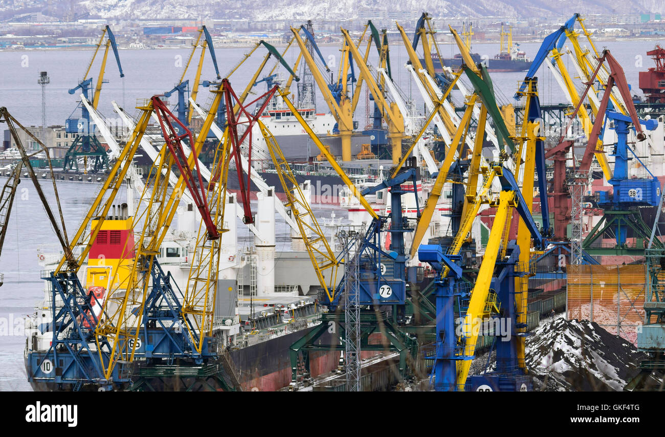 Marine cranes loads on a cargo ship. The storage area for loads Sea ...