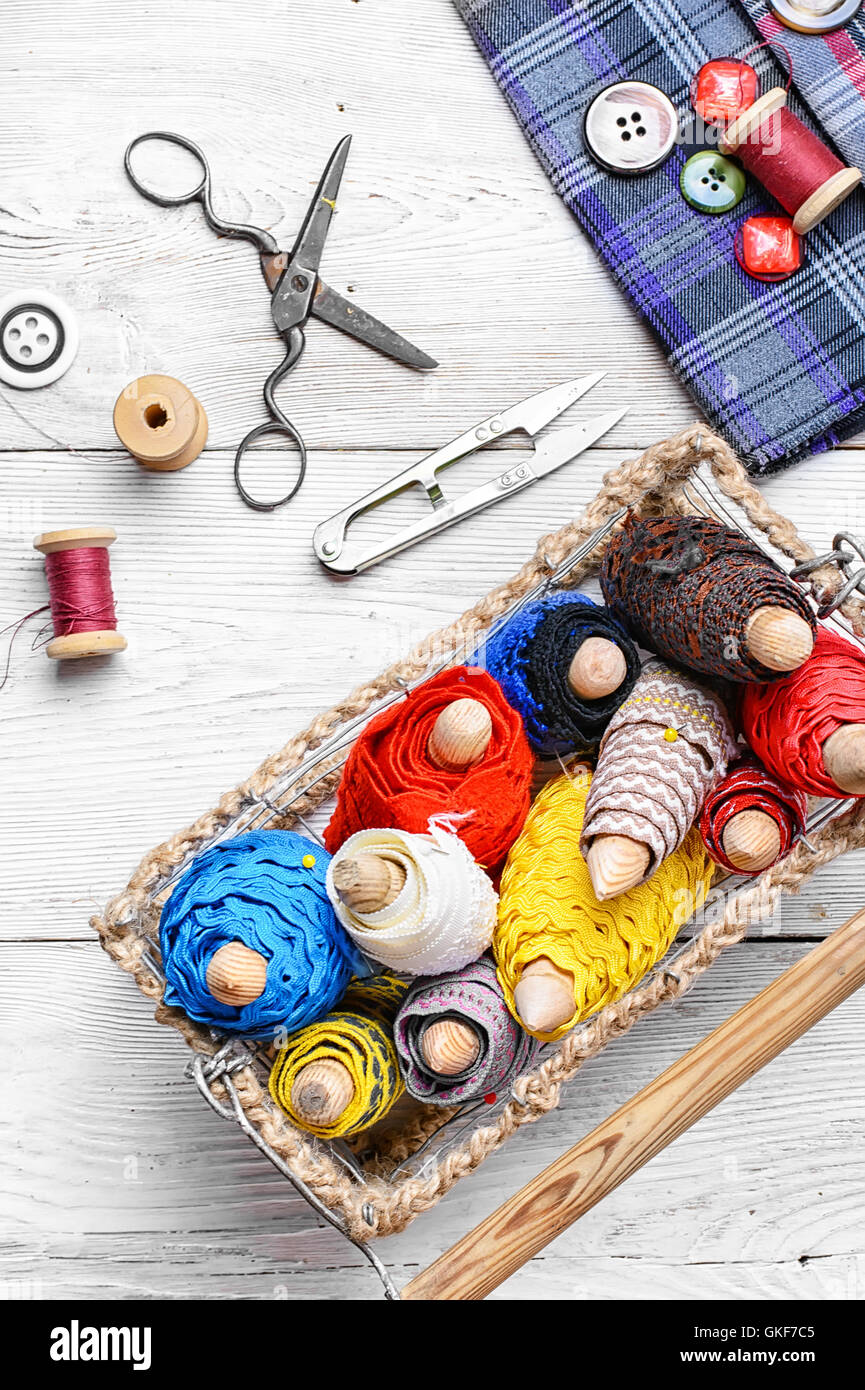 Set of tailor from the spool of lace,scissors,thread and buttons Stock ...