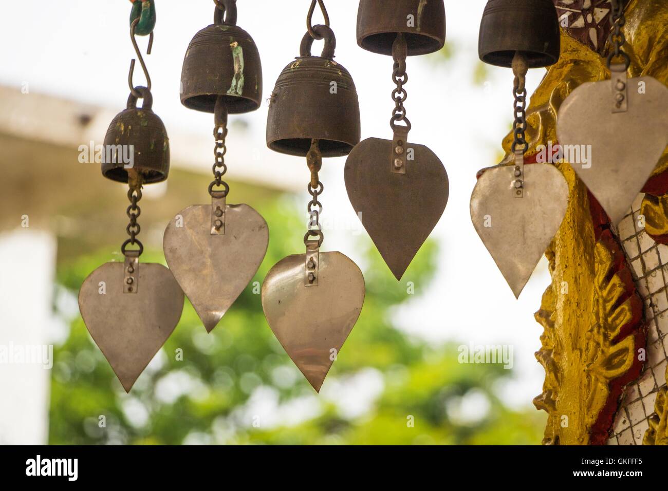 Row of golden bells in buddhist temple Stock Photo - Alamy