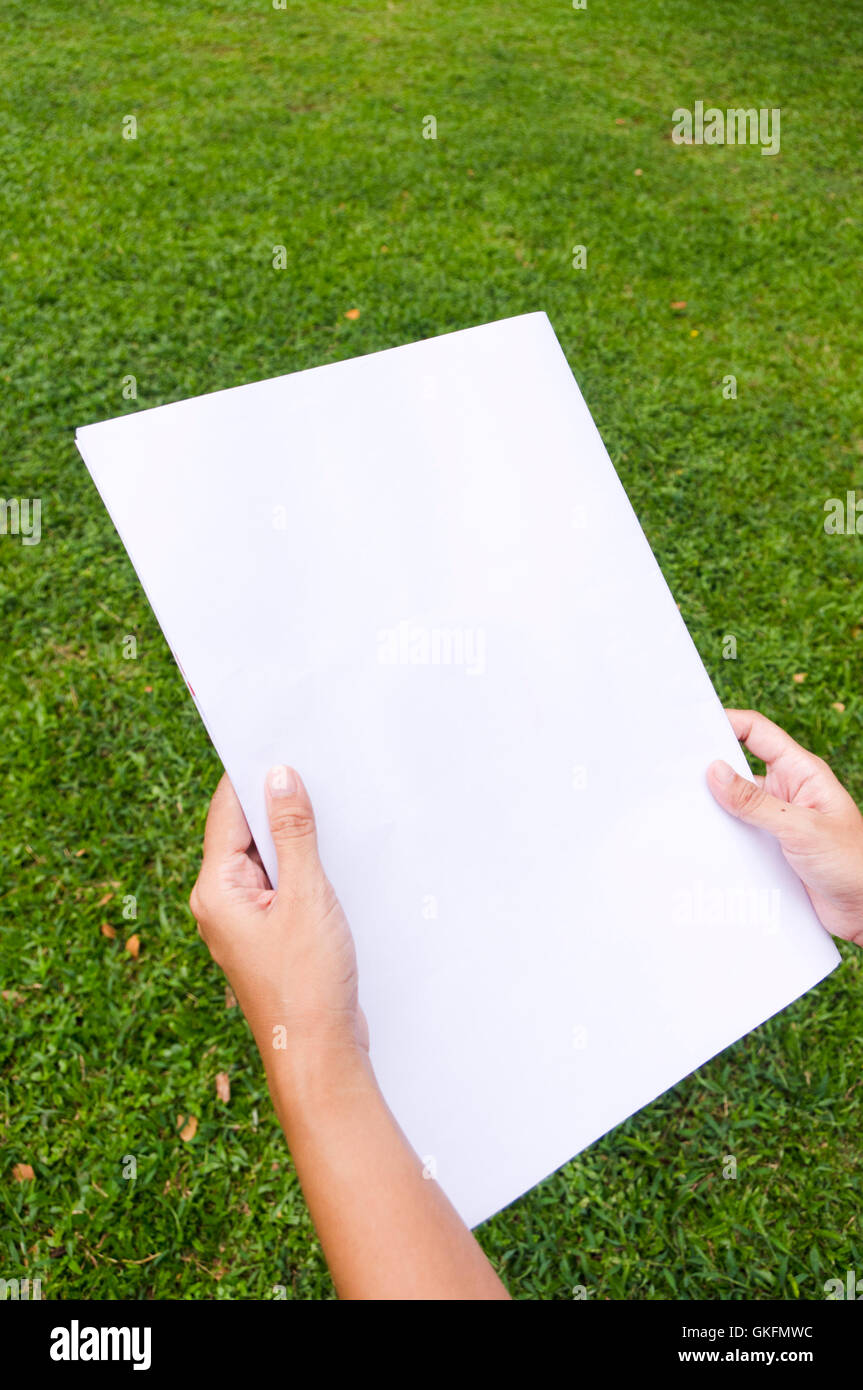 Hand holding pamphlet hi-res stock photography and images - Alamy