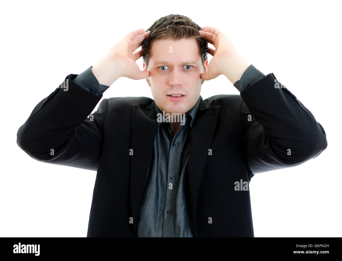 Portrait of a young business man looking depressed from work. Isolated ...