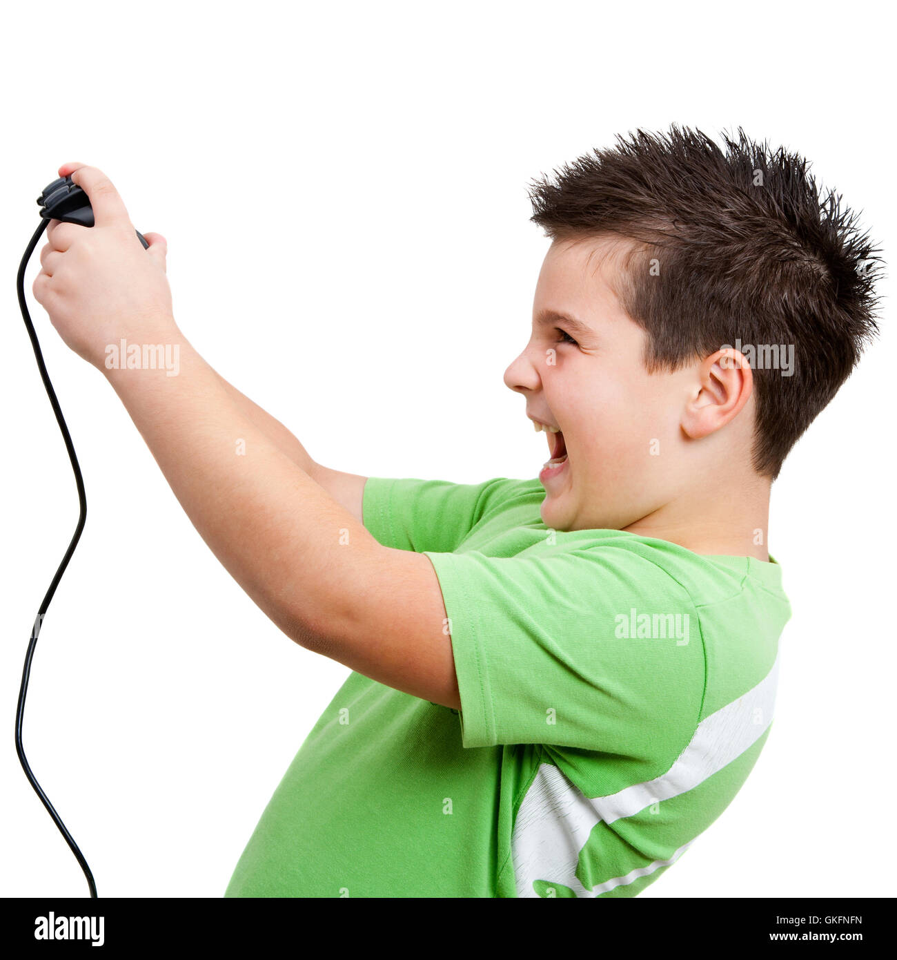 Boy playing with game console Stock Photo - Alamy