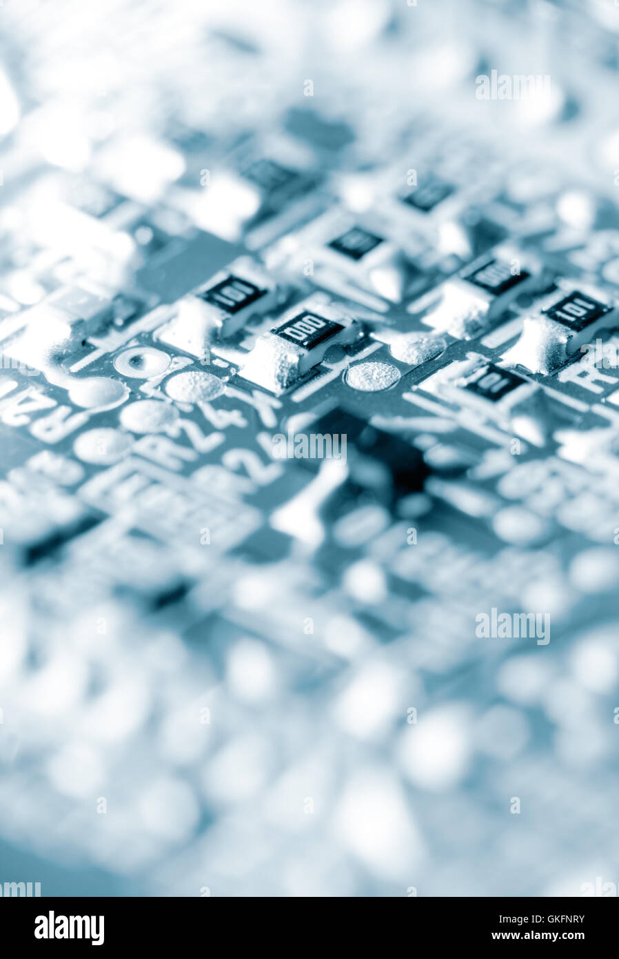 Close-up of electronic circuit board, blue toned Stock Photo - Alamy
